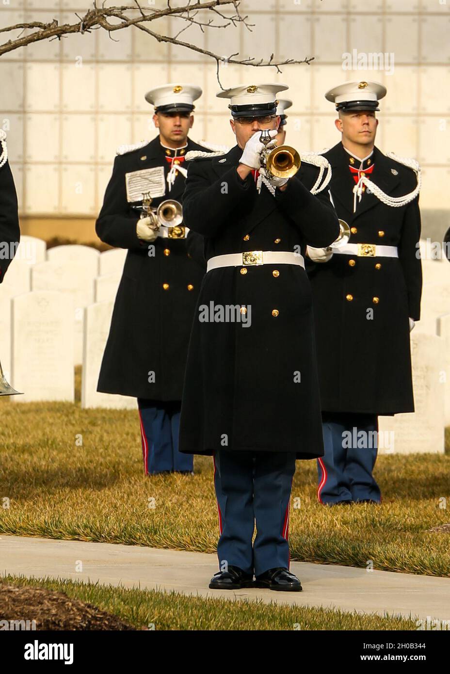 A Marine with “The President’s Own,” U.S. Marine Band performs Taps ...