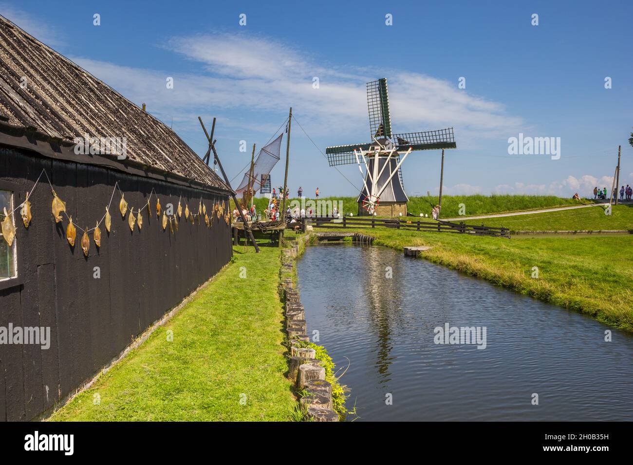 Historic windmill at the dike in Enkhuizen, Netherlands Stock Photo - Alamy
