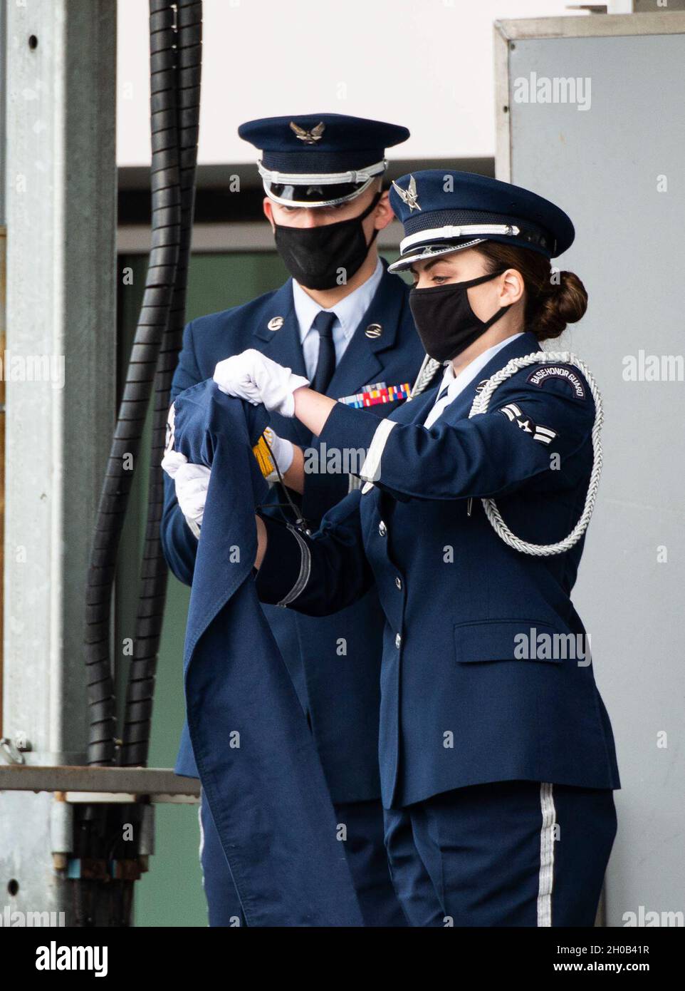 Honor Guard members from Wright-Patterson Air Force Base, Ohio, furl ...