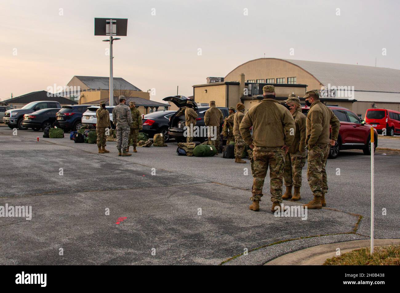 Air National Guard Members wait to be briefed before their departure to ...