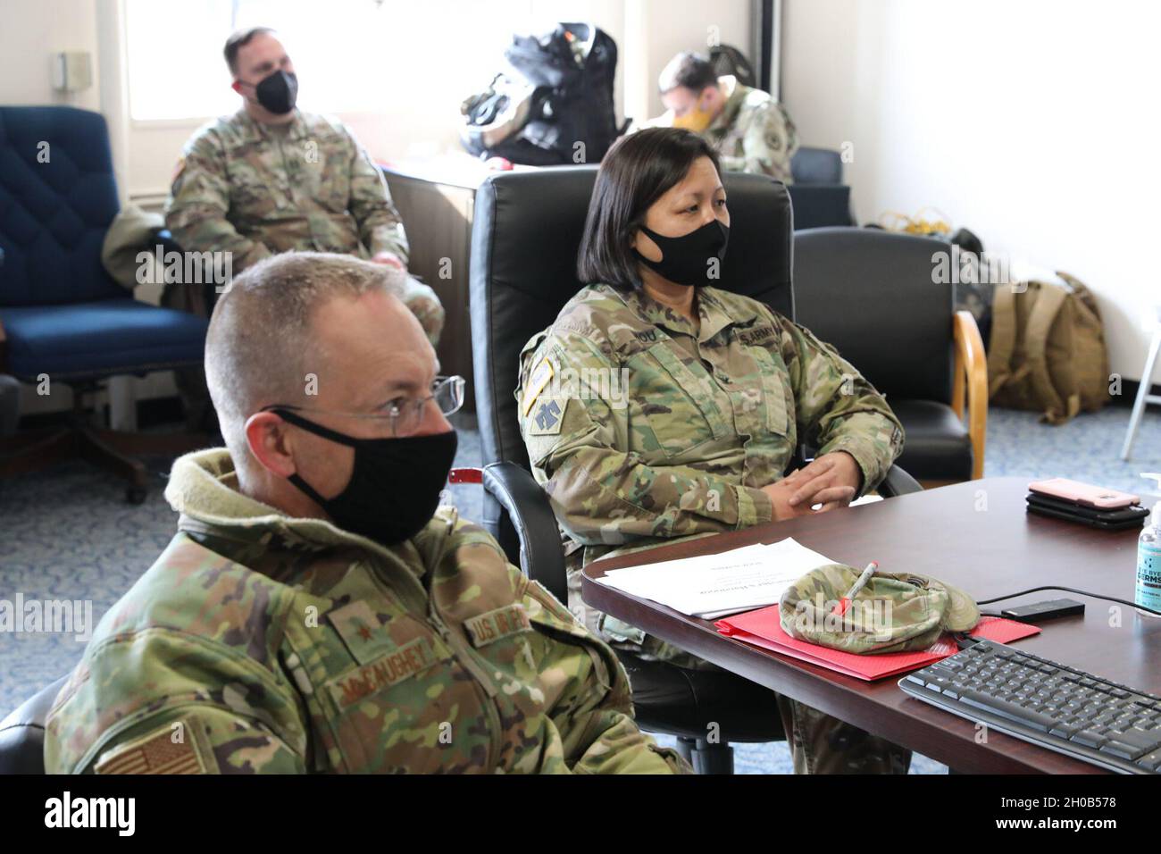 U.S. Air Force Brig. Gen. Wayne McCaughey, left, director of joint ...