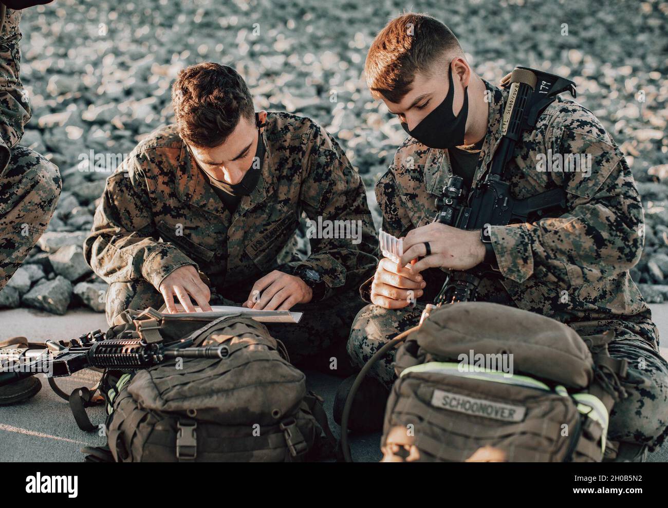 U.S. Marine Corps Cpl. Benjamin Reed, left, and Lance Cpl. Nicholas ...