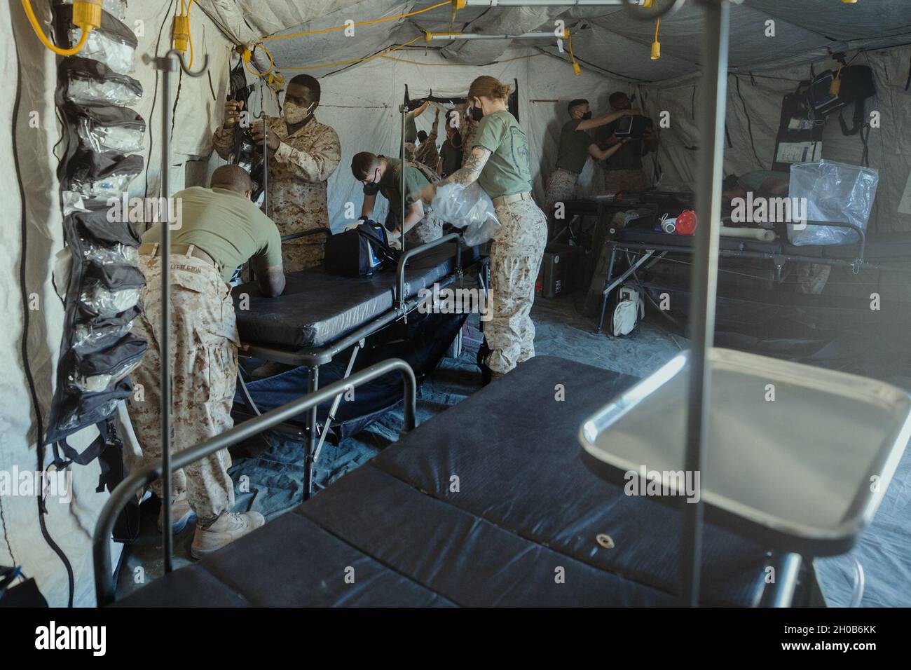 U.S. Marines and U.S. Navy Sailors assemble a forward resuscitative ...