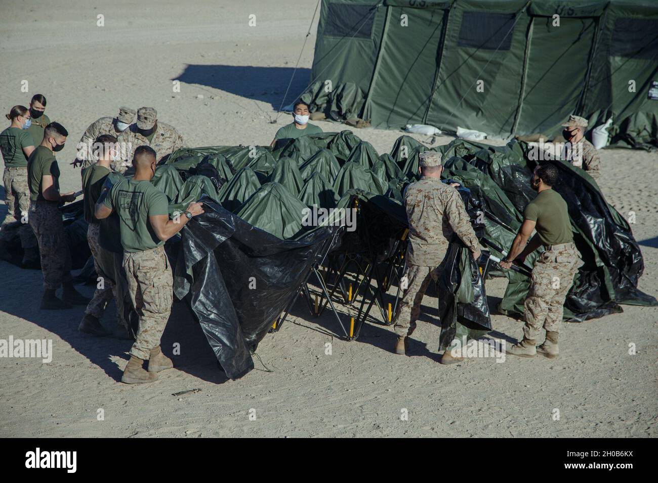 U.S. Marines and U.S. Navy Sailors assemble a forward resuscitative ...