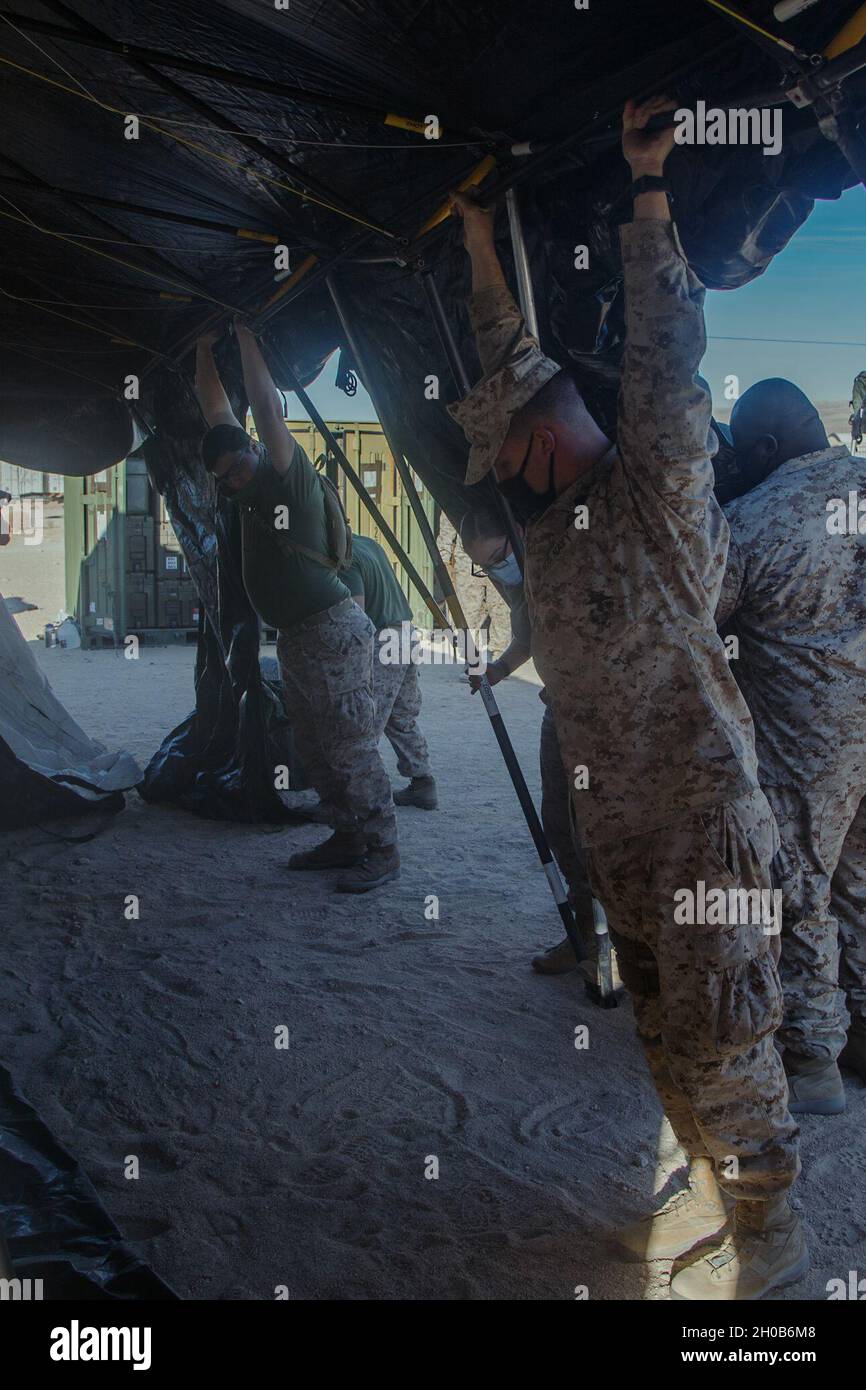 U.S. Marines and U.S. Navy Sailors assemble a forward resuscitative ...