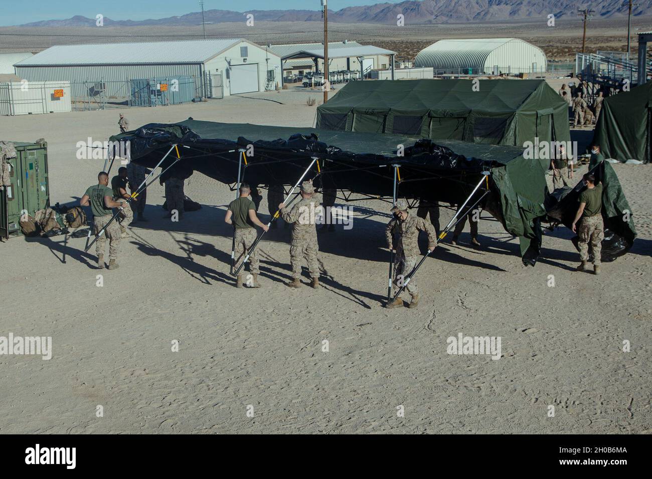 U.S. Marines and U.S. Navy Sailors assemble a forward resuscitative ...