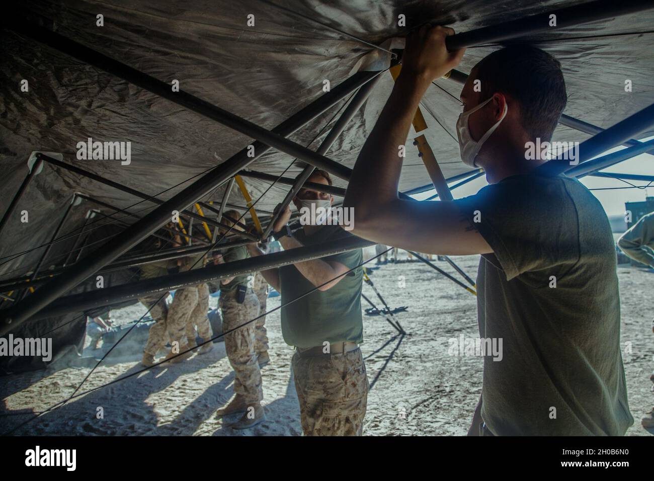 U.S. Marines and U.S. Navy Sailors assemble a forward resuscitative ...