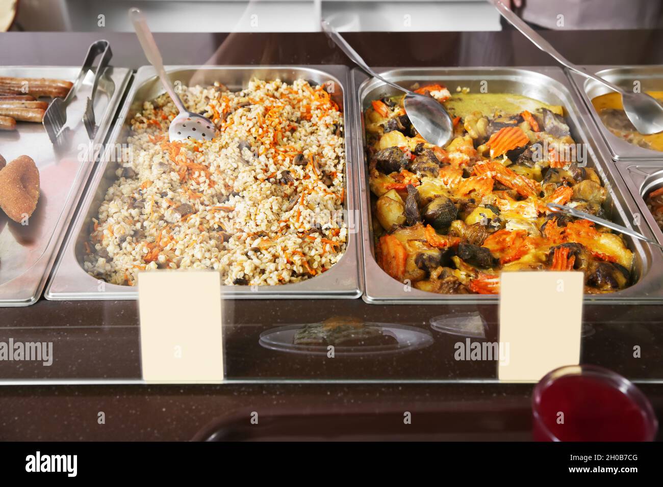 Containers with healthy food in school canteen Stock Photo - Alamy