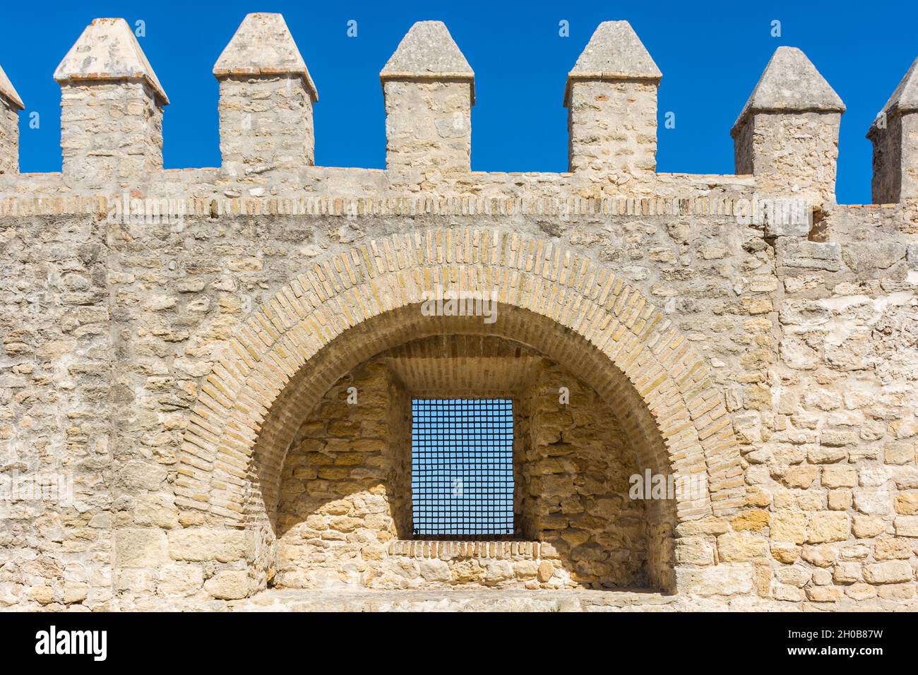 Embrasure on the medieval walls of Vejer de la Frontera. Cadiz ...