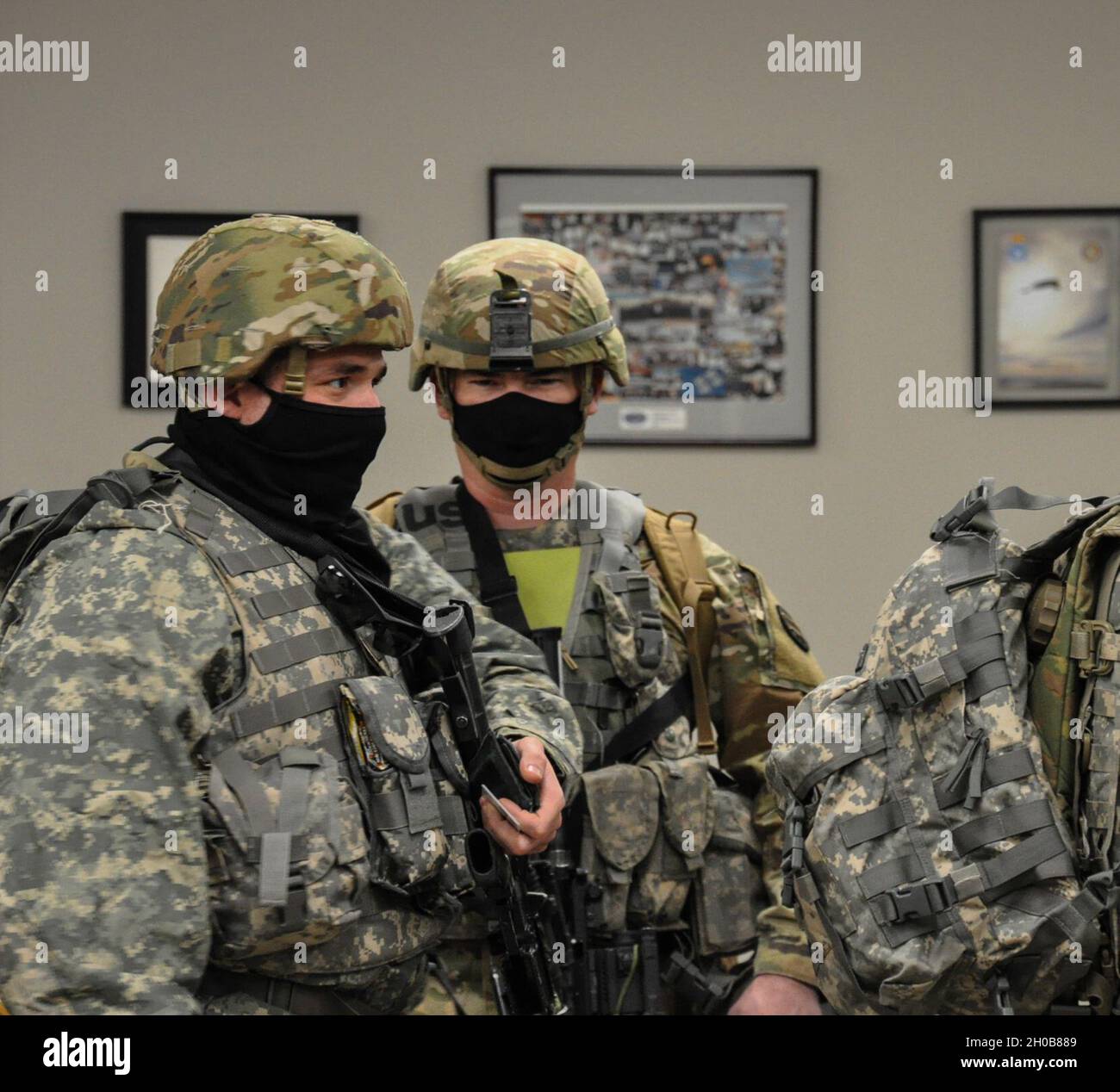 Soldiers from the 1st Squadron 221st Cavalry await their deployment ...