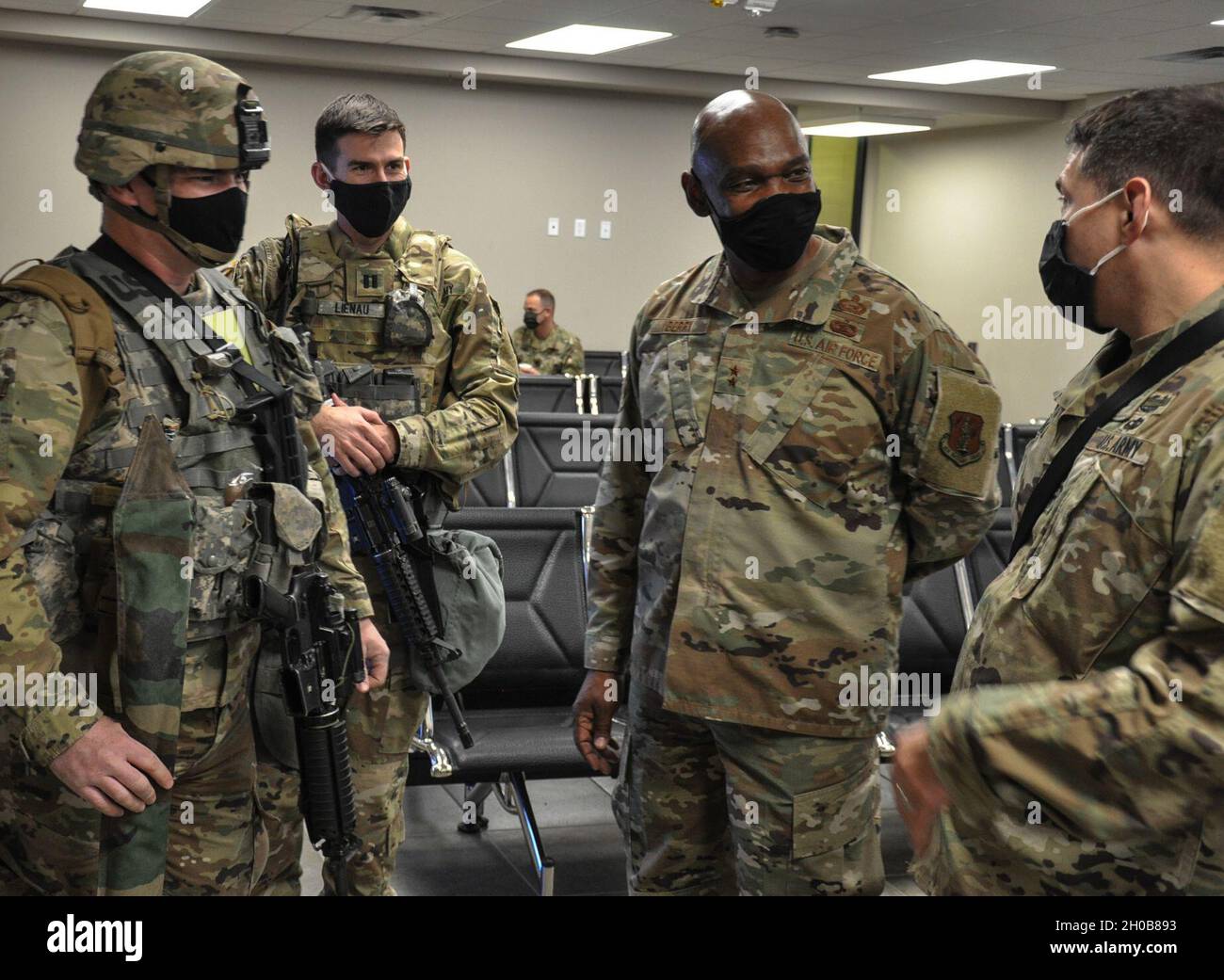 Maj. Gen. Ondra Berry speaks with Soldiers from the 1st Squadron 221st ...