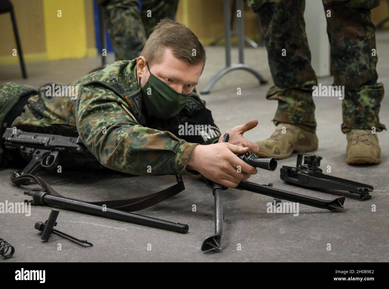 A German Feldjaeger 3 military policeman assigned to NATO-enhanced ...