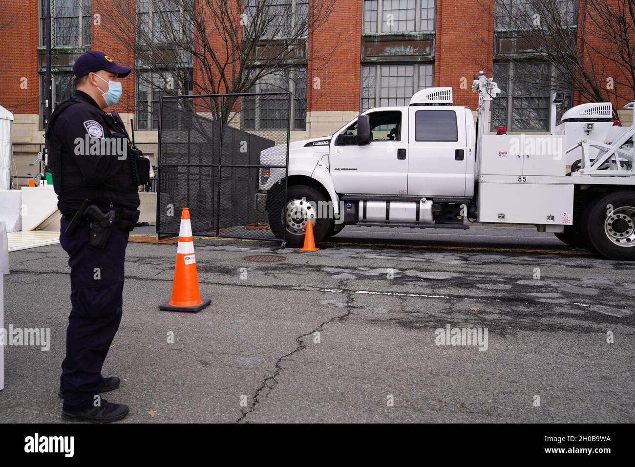 A U.S. Customs and Border Protection officer monitors progress of non ...
