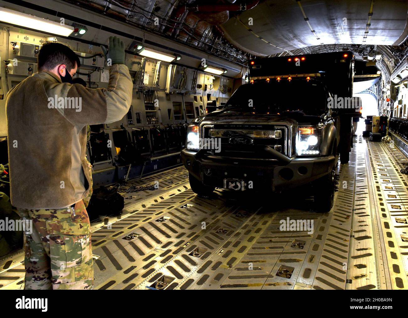 U.S. Air Force Staff Sgt. Peter Simpson, 6th Airlift Squadron ...