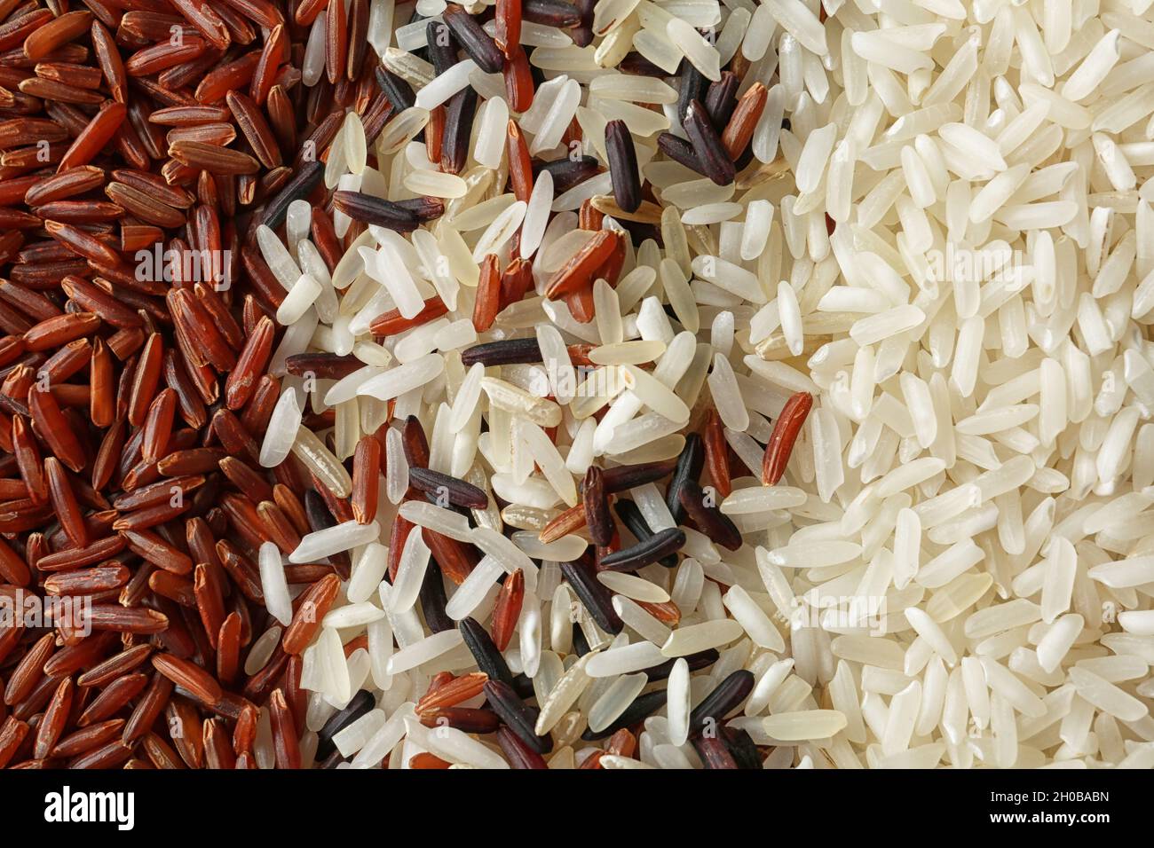 Brown and other types of rice as background, closeup Stock Photo - Alamy