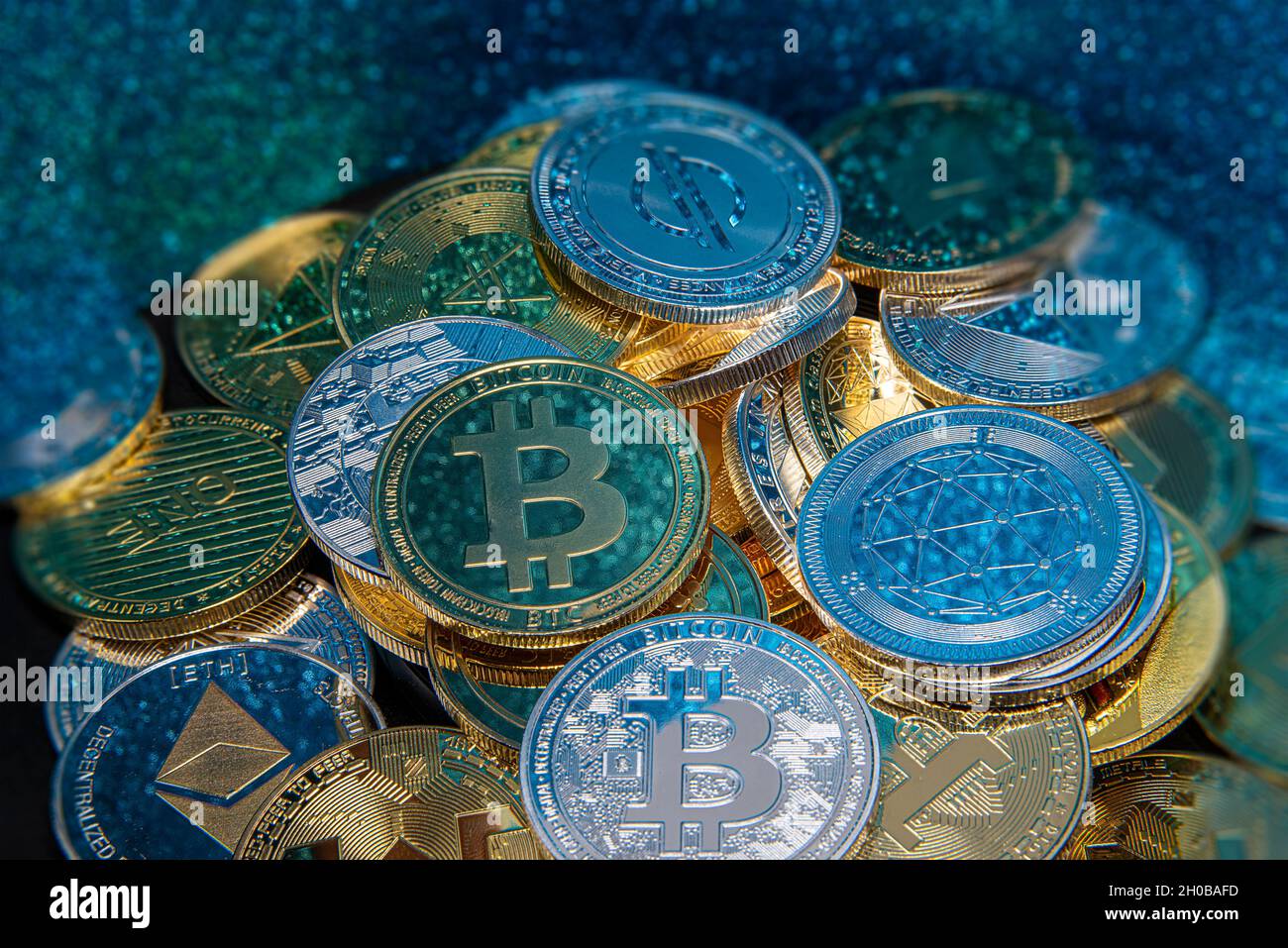 Horizontal view of cryptocurrency tokens, including Bitcoin, Ethererum ...