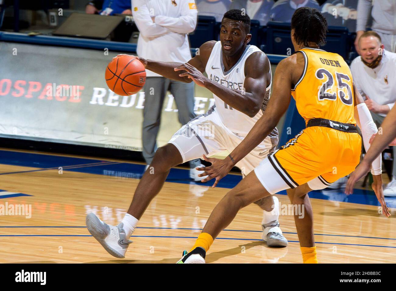 U.S. Air Force Academy -- Air Force's Ameka Akaya drives past the ...