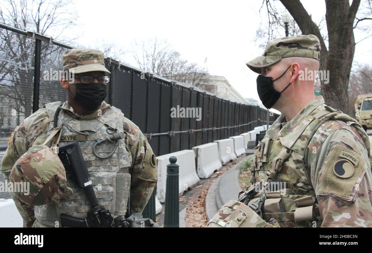 U.S. Army Lt. Col. Robert P. “Beau” Mason, right, commander of the ...