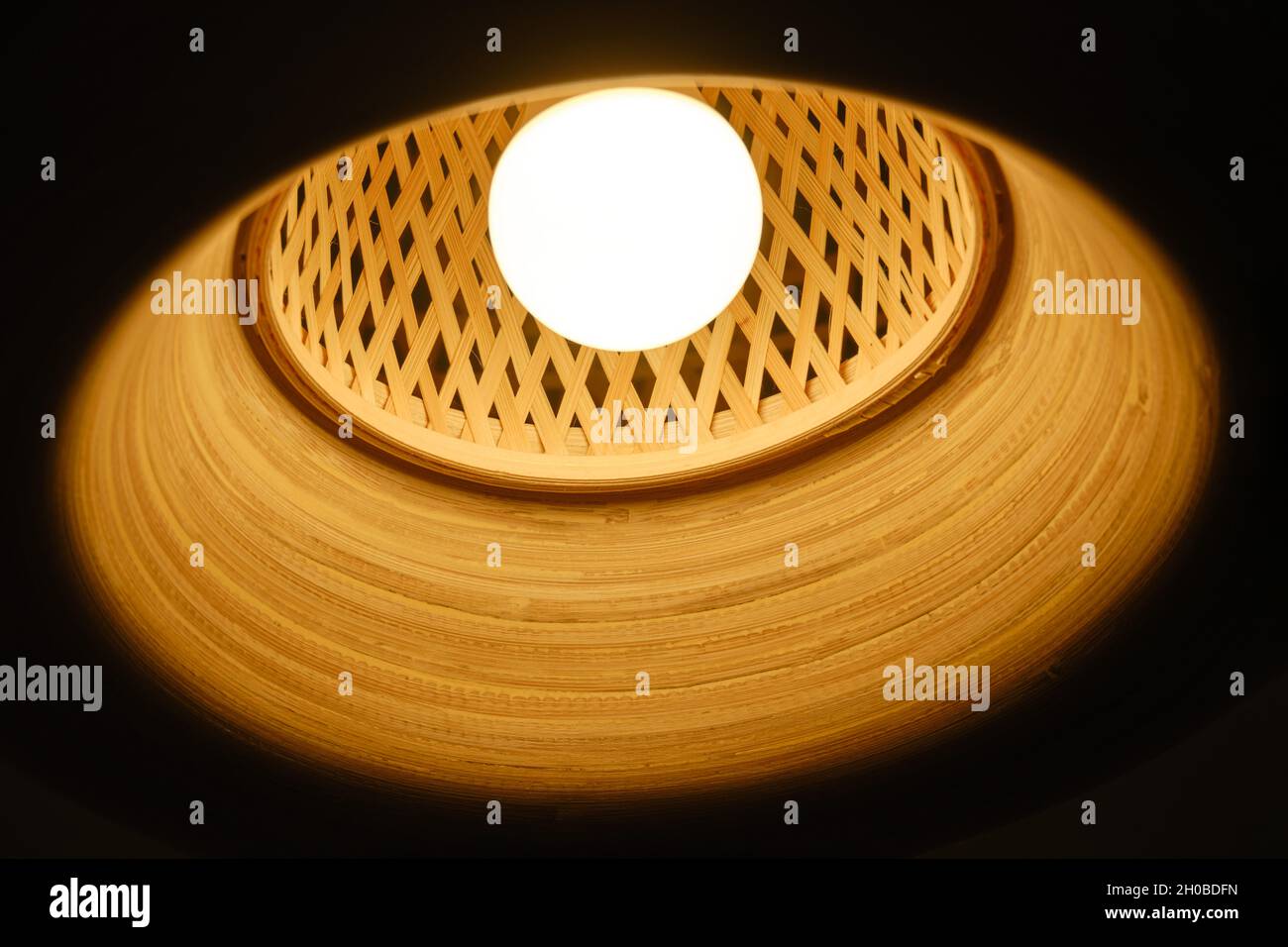 Bamboo wooden chandelier with one lamp, bottom view Stock Photo - Alamy
