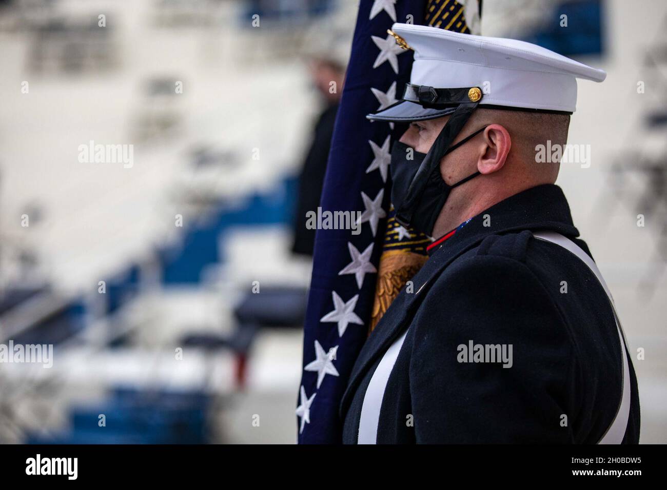 A member of the joint armed forces color guard participates during the ...