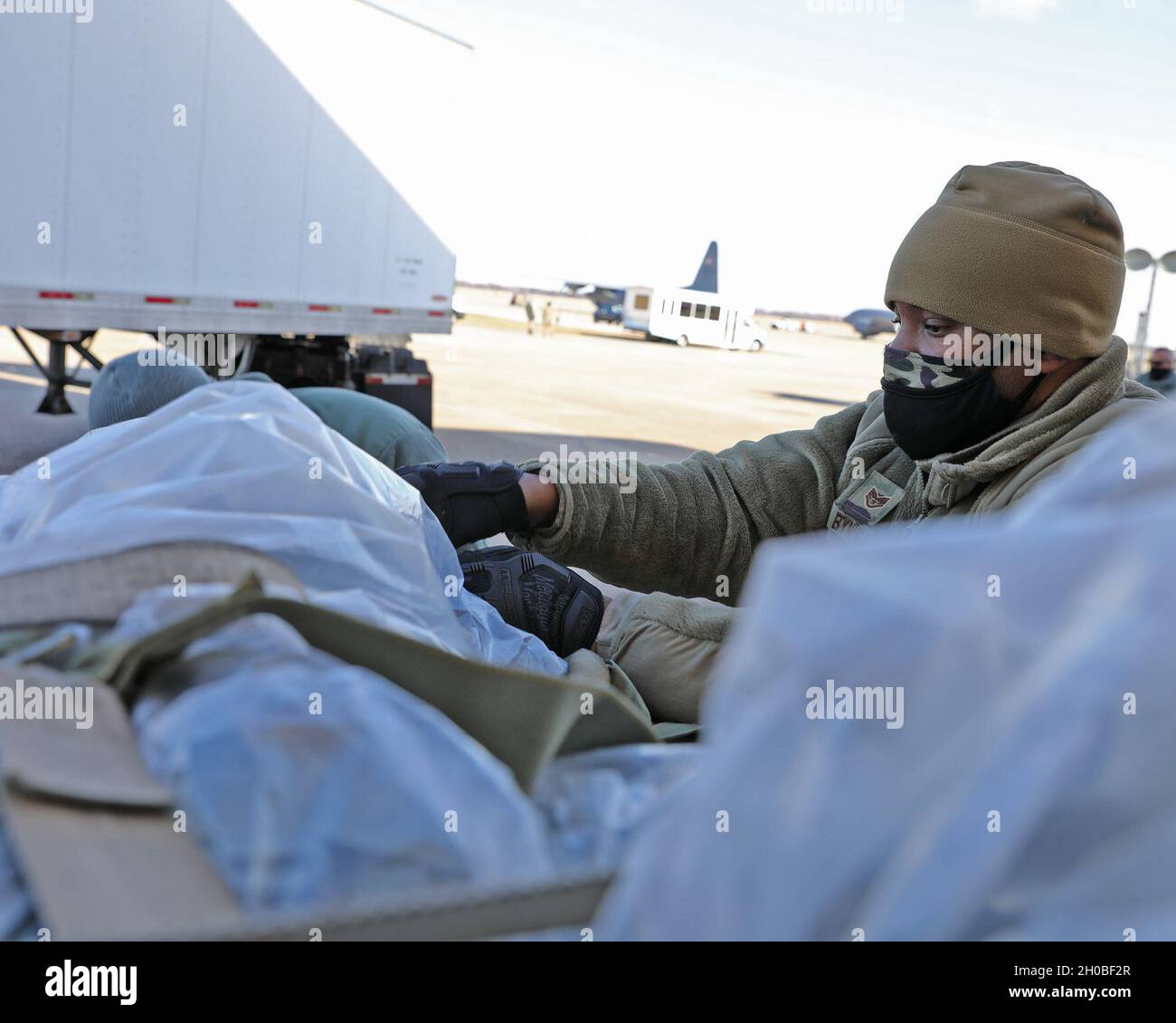 Staff Sgt. Lenny Bynum, an air transportation specialist assigned to ...