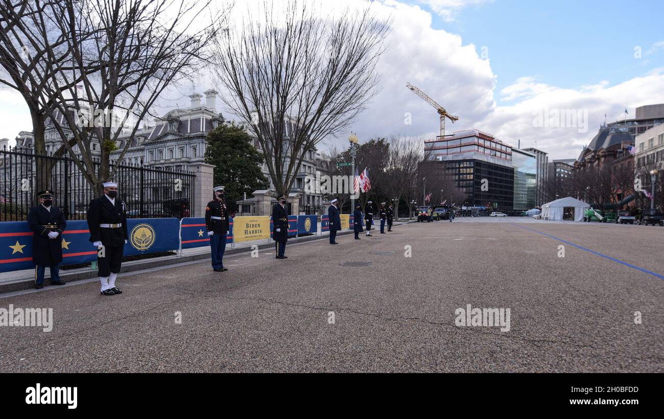 U.S. military cordon members stand at attention during the rehearsal of ...