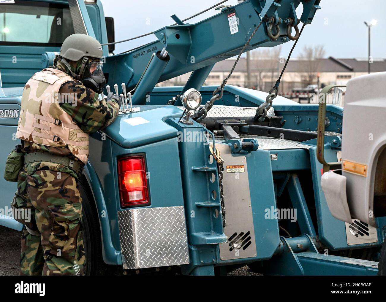 An Airman of the 377th Logistics Readiness Squadron operates a wrecker ...