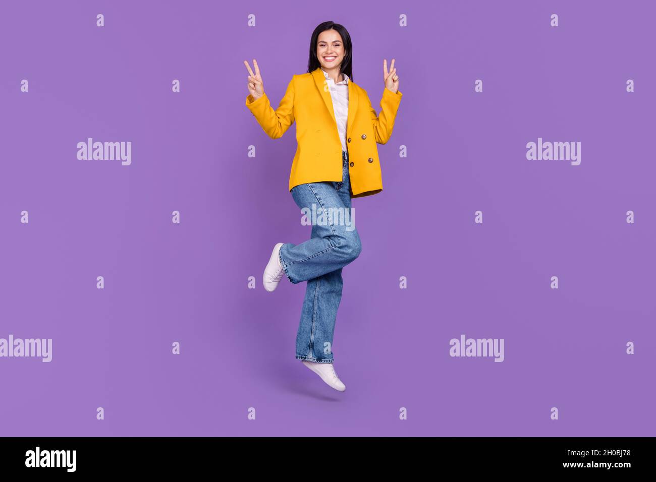 Full body photo of positive cheerful happy businesswoman jump make v ...