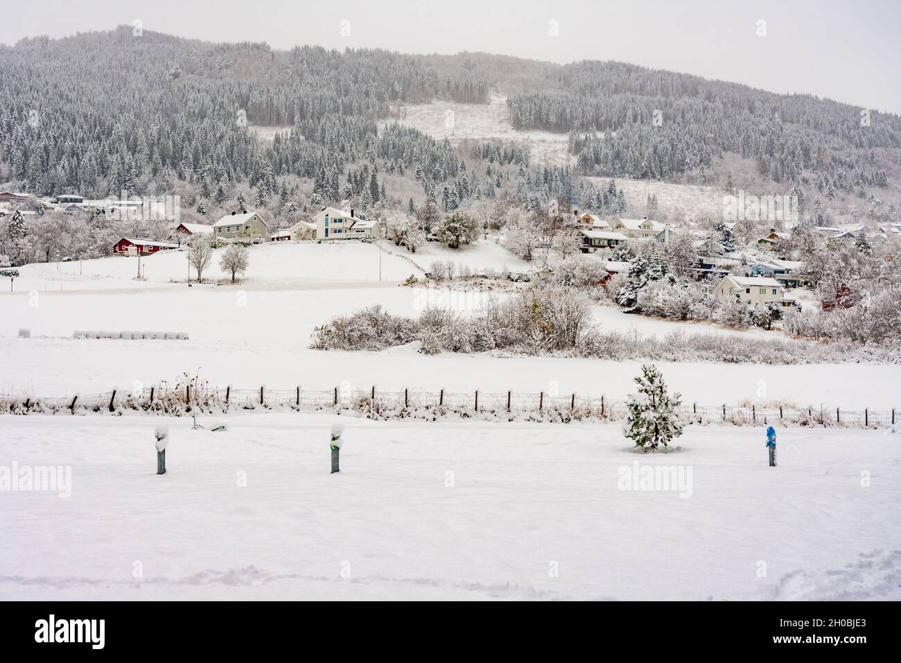 Scenic view of the Volda village covered with snow; winter in Norway ...