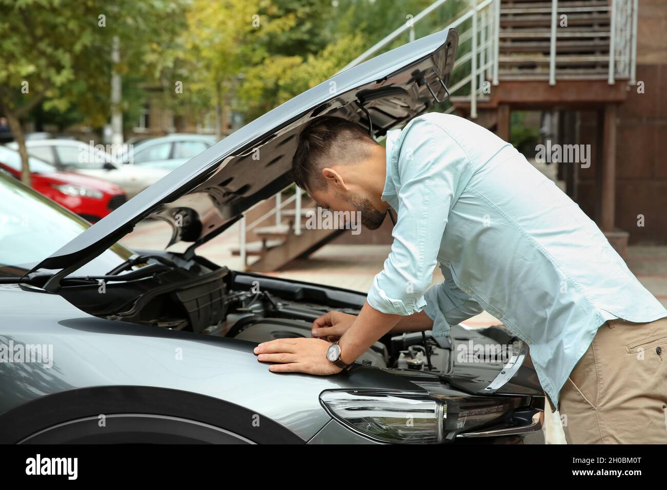Man Fixing Car