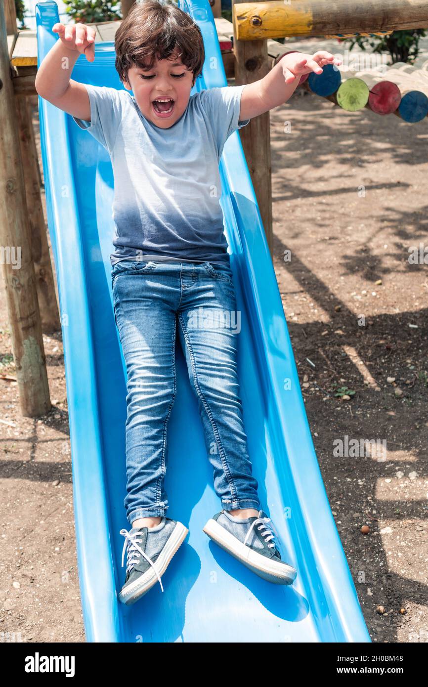 Hispanic kids playing park hi-res stock photography and images - Alamy