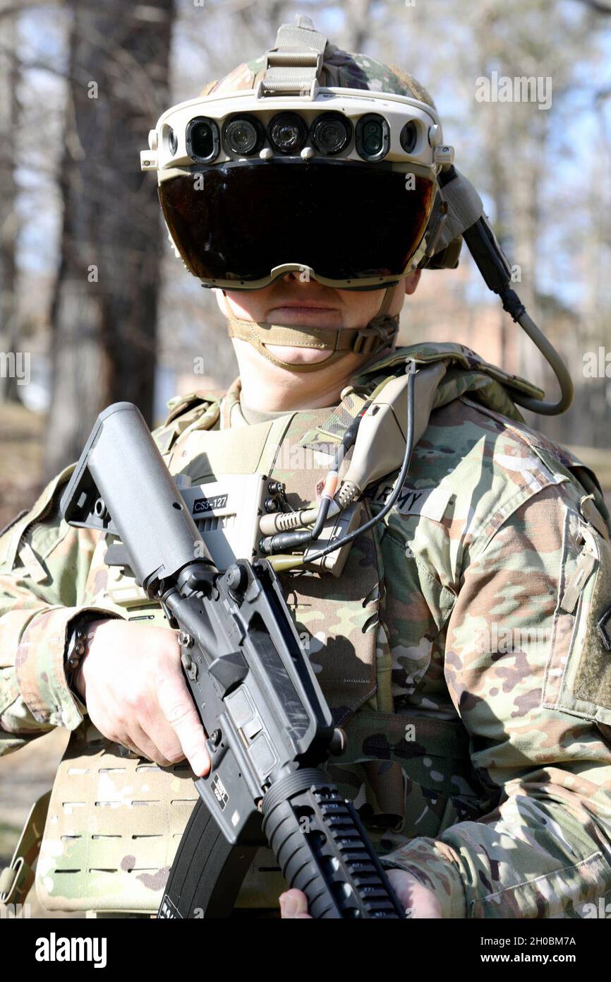 A Soldier dons the Integrated Visual Augmentation System (IVAS ...