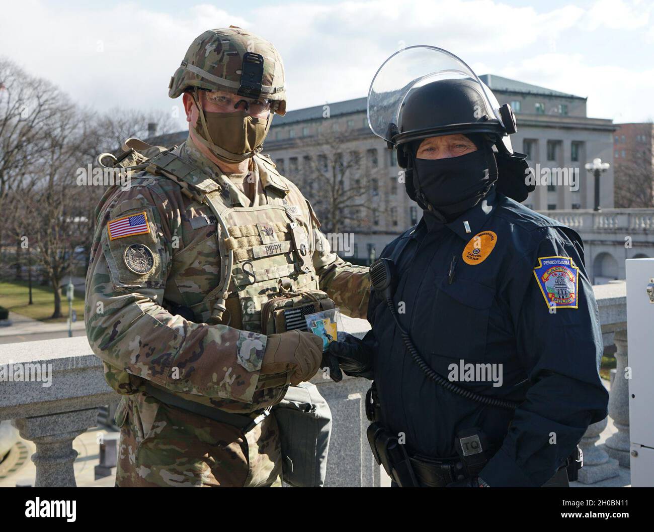 Col. John Pippy (Left), commander of the 55th Maneuver Enhancement ...