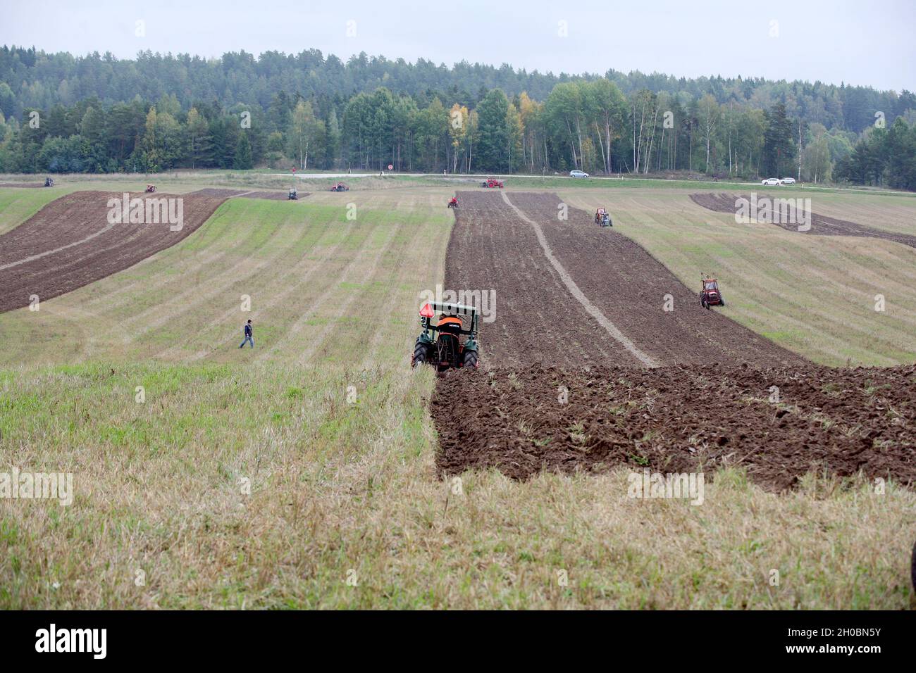 Field in Södermanland is plowed with tractors at autumn Stock Photo - Alamy