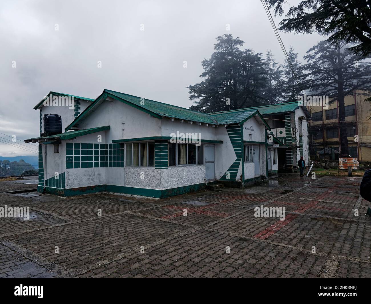 Building of Gadhwal Vikas Mandal Nigam hotel at Himalayan hill station ...