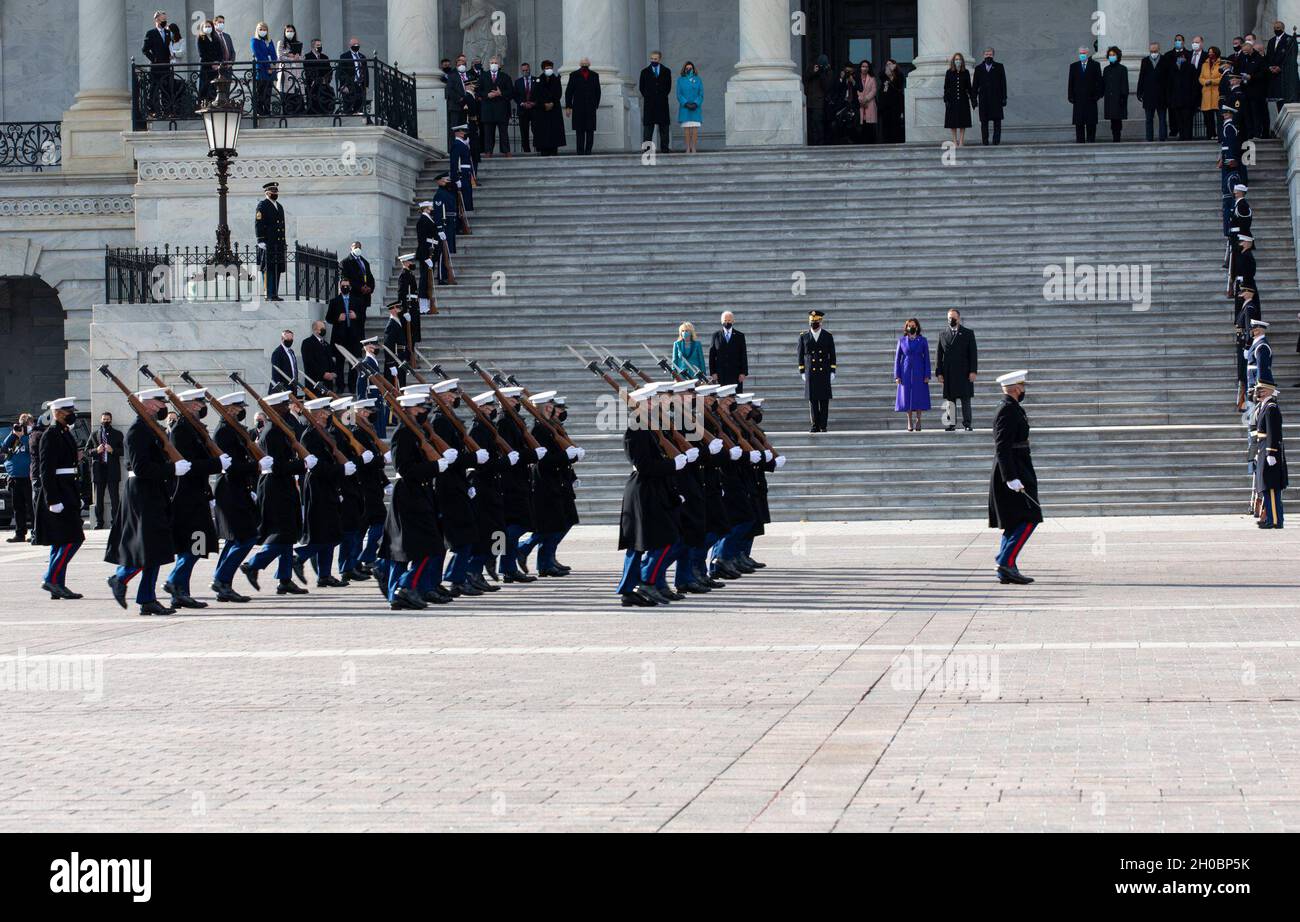 President Joseph R. Biden Jr. and Vice President Kamala Harris stand ...