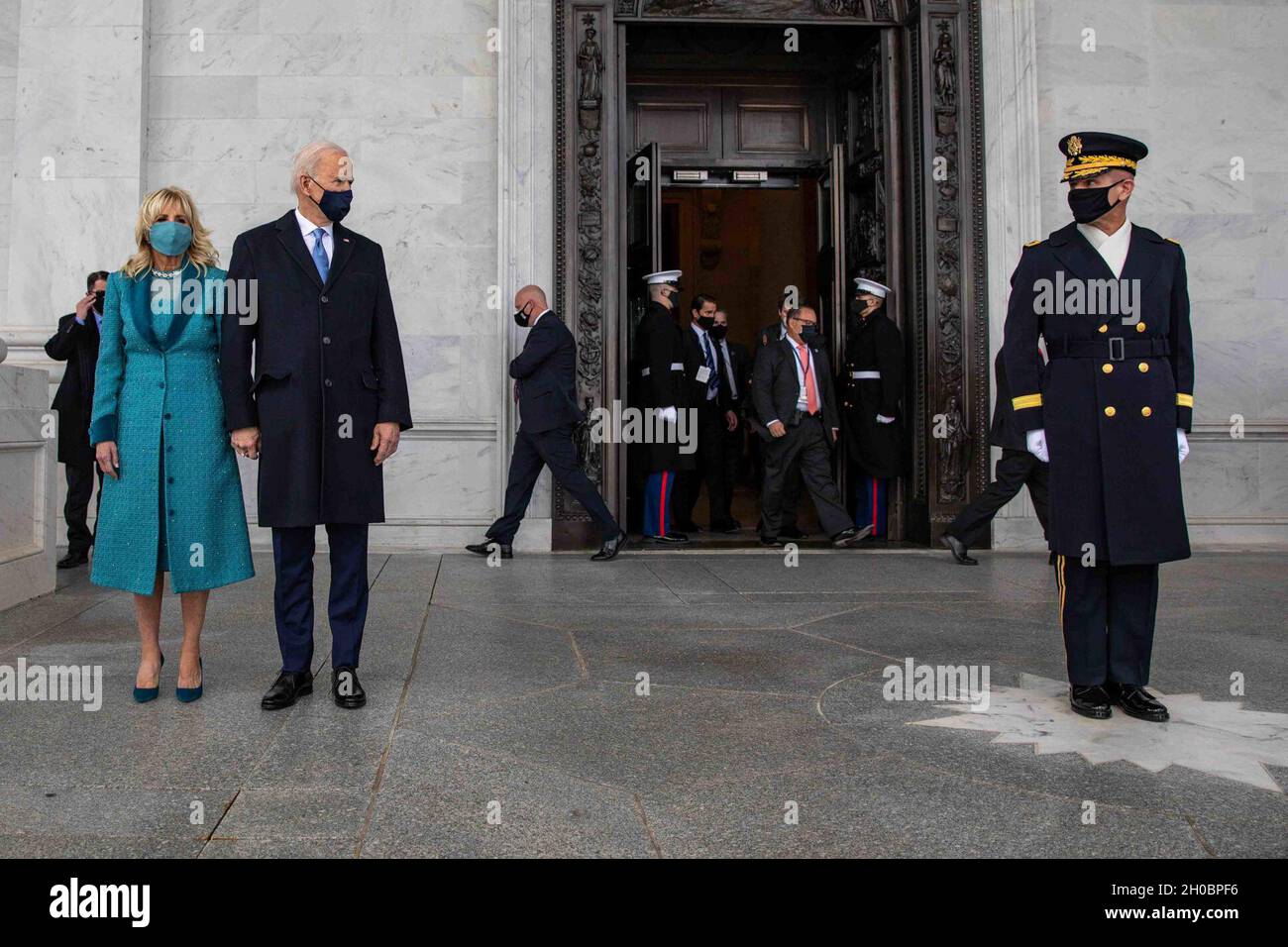 President Joseph R. Biden Jr. stands next to U.S. Army Maj. Gen. Omar J ...