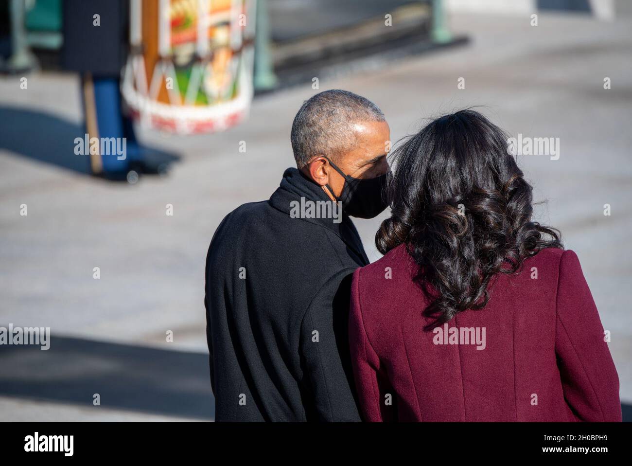 Former president Barack Obama stands with his wife, Michelle Obama ...