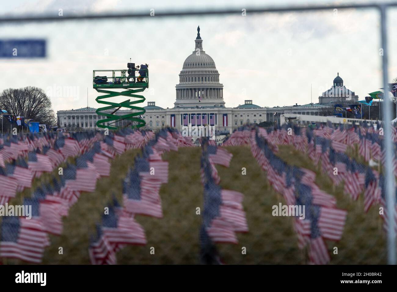 The United States Capitol Building stands in the background against a ...