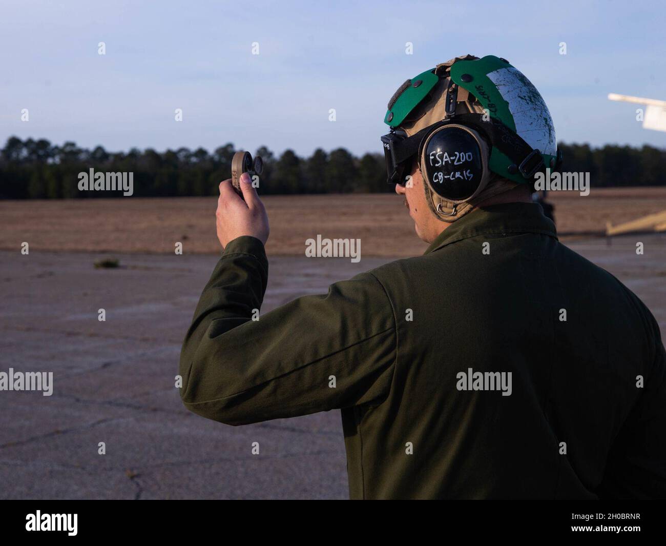 Lance Cpl. Irvin Serna, an aircraft avionics technician, checks wind ...