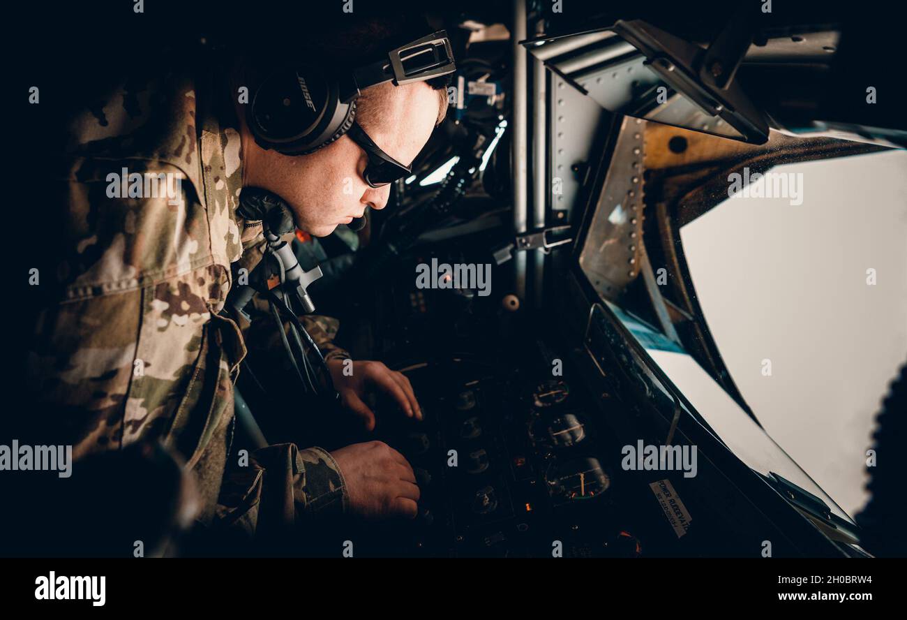 A U.S. Air Force KC-135 Stratotanker in-flight refueling specialist ...