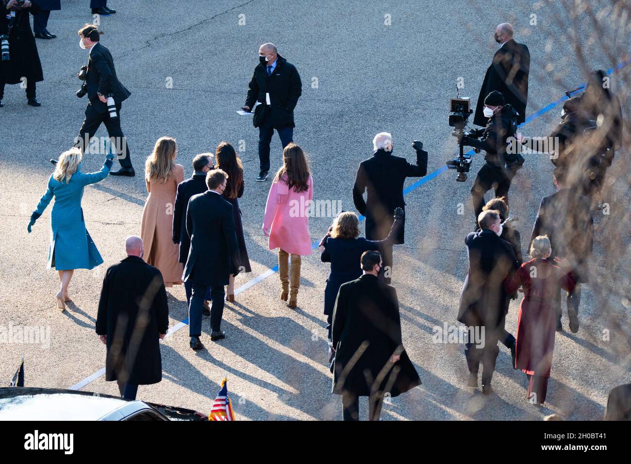 President Joseph R. Biden Jr. and first lady Dr. Jill Biden wave during ...