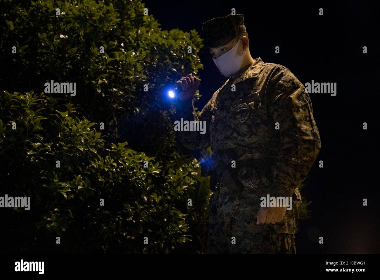 U.S. Marine Corps Cpl. Staling Amador, a watch commander with the Camp ...