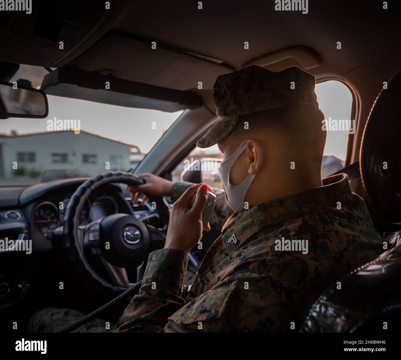 U.S. Marine Corps Cpl. Staling Amador, a watch commander with the Camp ...