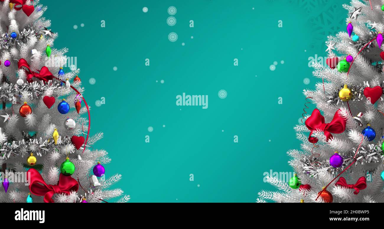 Image of falling snowflakes over christmas trees Stock Photo - Alamy