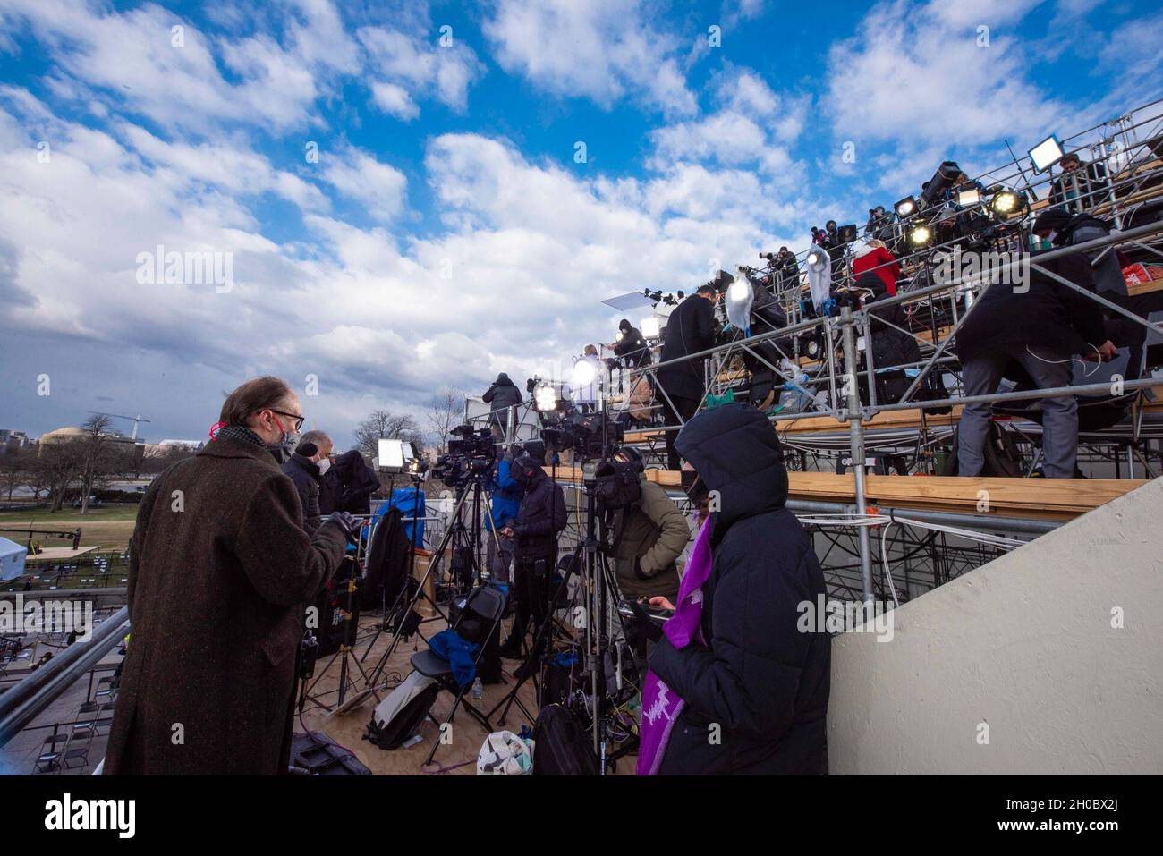 Members of the media report as the 59th Presidential Inauguration ...