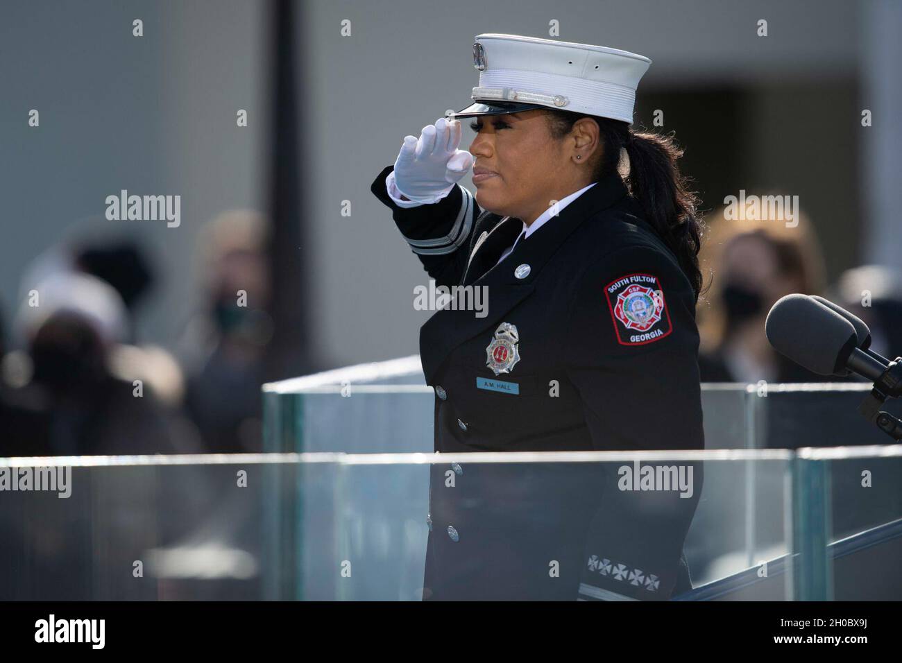 Capt. Andrea Hall, fire captain of South Fulton, Ga., salutes after ...
