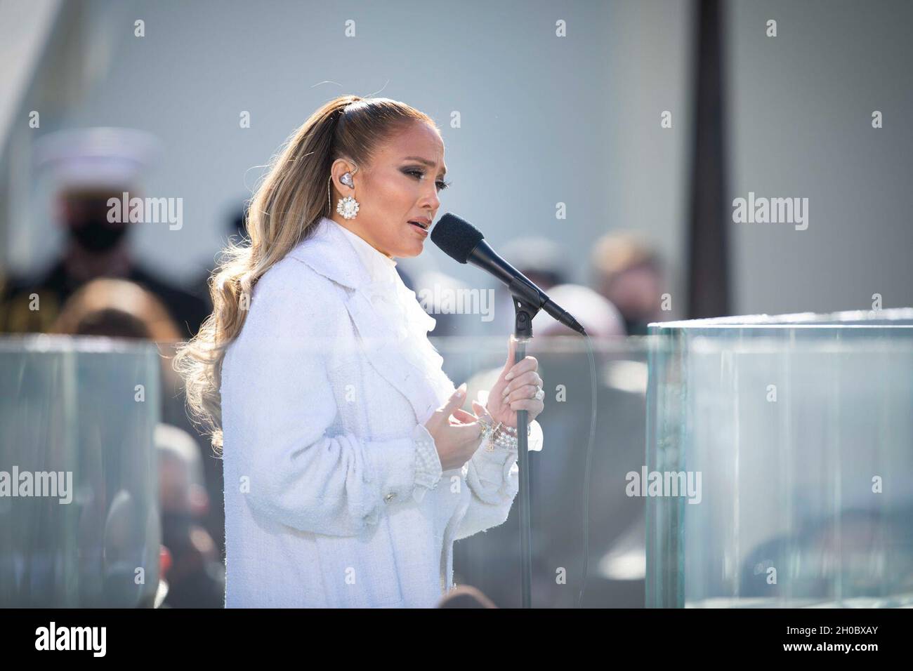 Jennifer Lopez sings “This Land Is Your Land” and “America the ...