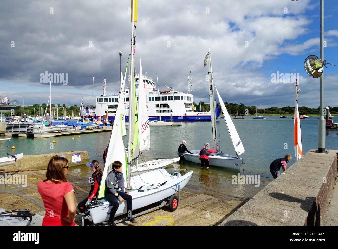 Launching dinghies down the slipway as the Isle of Wight car ferry ...