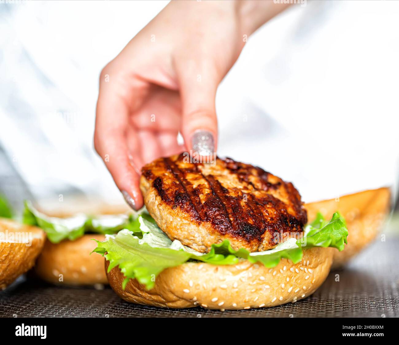 Burger making at home hi-res stock photography and images - Alamy